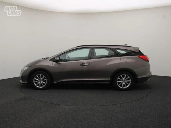 Brown Honda Civic 2014 in Vilnius, with an engine capacity of 1.60 L and mileage of 91 thousand km for 7799 €, photo 6 on AUTOMOTO.COM.LV