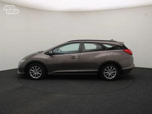 Brown Honda Civic 2014 in Vilnius, with an engine capacity of 1.60 L and mileage of 91 thousand km for 7799 €, photo 7 on AUTOMOTO.COM.LV