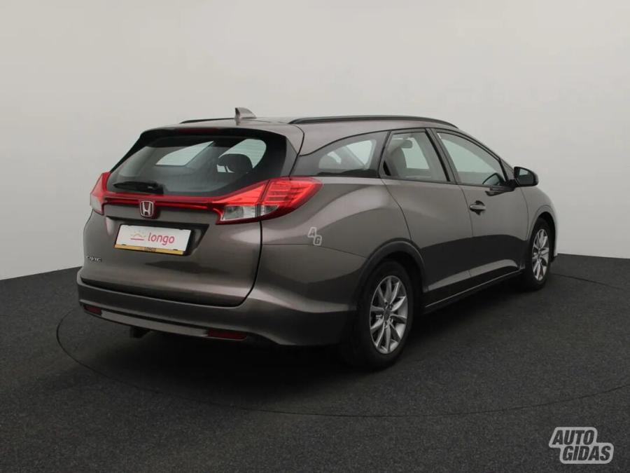 Brown Honda Civic 2014 in Vilnius, with an engine capacity of 1.60 L and mileage of 91 thousand km for 7799 €, photo 9 on AUTOMOTO.COM.LV