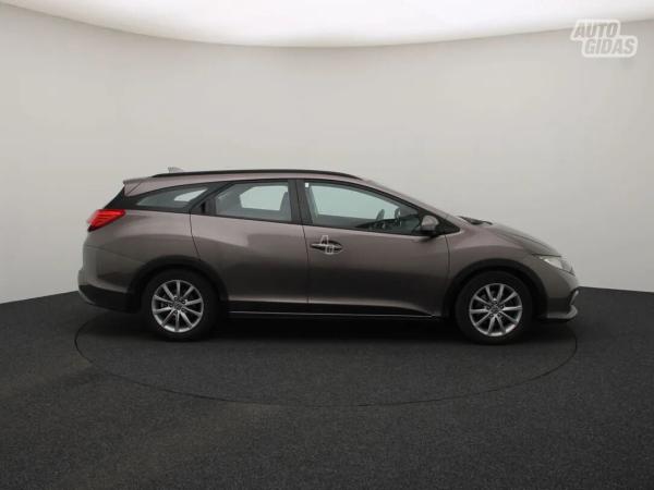 Brown Honda Civic 2014 in Vilnius, with an engine capacity of 1.60 L and mileage of 91 thousand km for 7799 €, photo 9 on AUTOMOTO.COM.LV