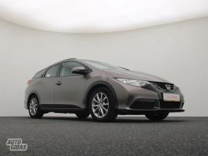 Brown Honda Civic 2014 in Vilnius, with an engine capacity of 1.60 L and mileage of 91 thousand km for 7799 €, photo 12 on AUTOMOTO.COM.LV