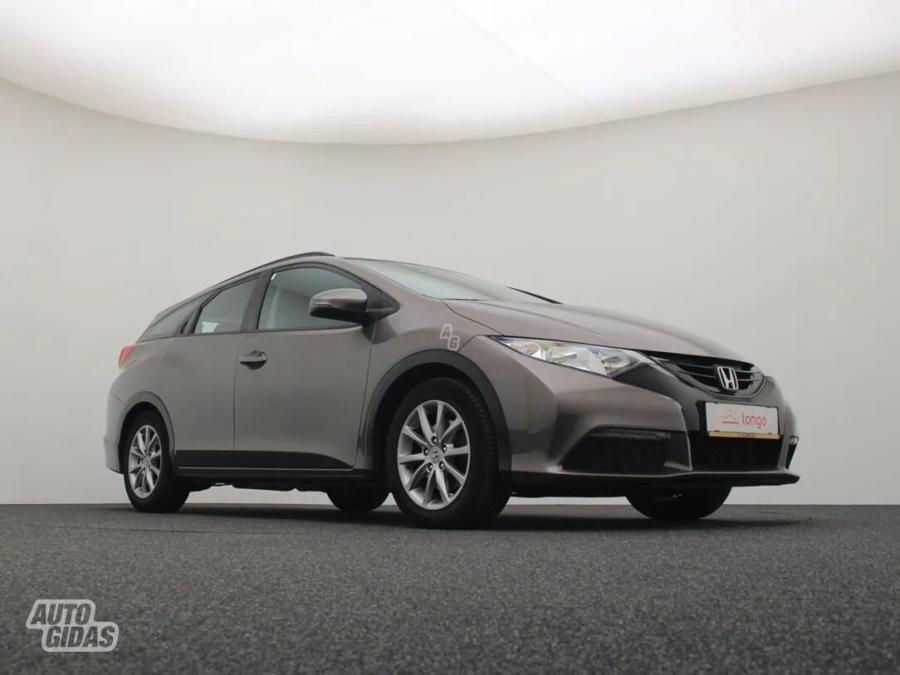 Brown Honda Civic 2014 in Vilnius, with an engine capacity of 1.60 L and mileage of 91 thousand km for 7799 €, photo 12 on AUTOMOTO.COM.LV