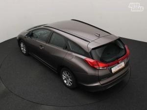 Brown Honda Civic 2014 in Vilnius, with an engine capacity of 1.60 L and mileage of 91 thousand km for 7799 €, photo 13 on AUTOMOTO.COM.LV