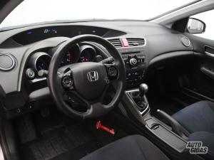 Brown Honda Civic 2014 in Vilnius, with an engine capacity of 1.60 L and mileage of 91 thousand km for 7799 €, photo 17 on AUTOMOTO.COM.LV