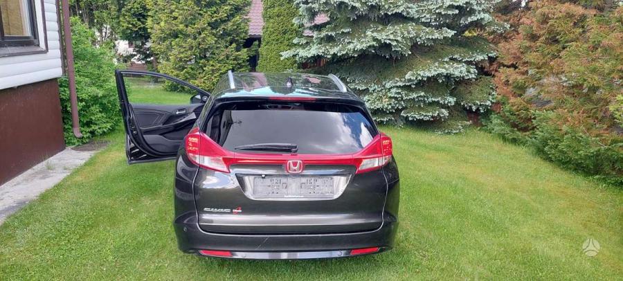 Brown Honda Civic 2016 in Trakai, with an engine capacity of 1.80 L and mileage of 171 thousand km for 3140 €, photo 9 on AUTOMOTO.COM.LV