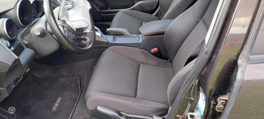 Brown Honda Civic 2016 in Trakai, with an engine capacity of 1.80 L and mileage of 171 thousand km for 3140 €, photo 27 on AUTOMOTO.COM.LV