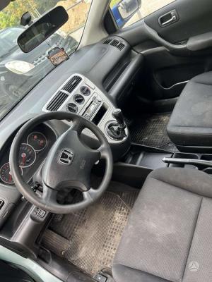 Green Honda Civic 2004 in Vilnius, with an engine capacity of 1.40 L and mileage of 194 thousand km for 1300 €, photo 9 on AUTOMOTO.COM.LV