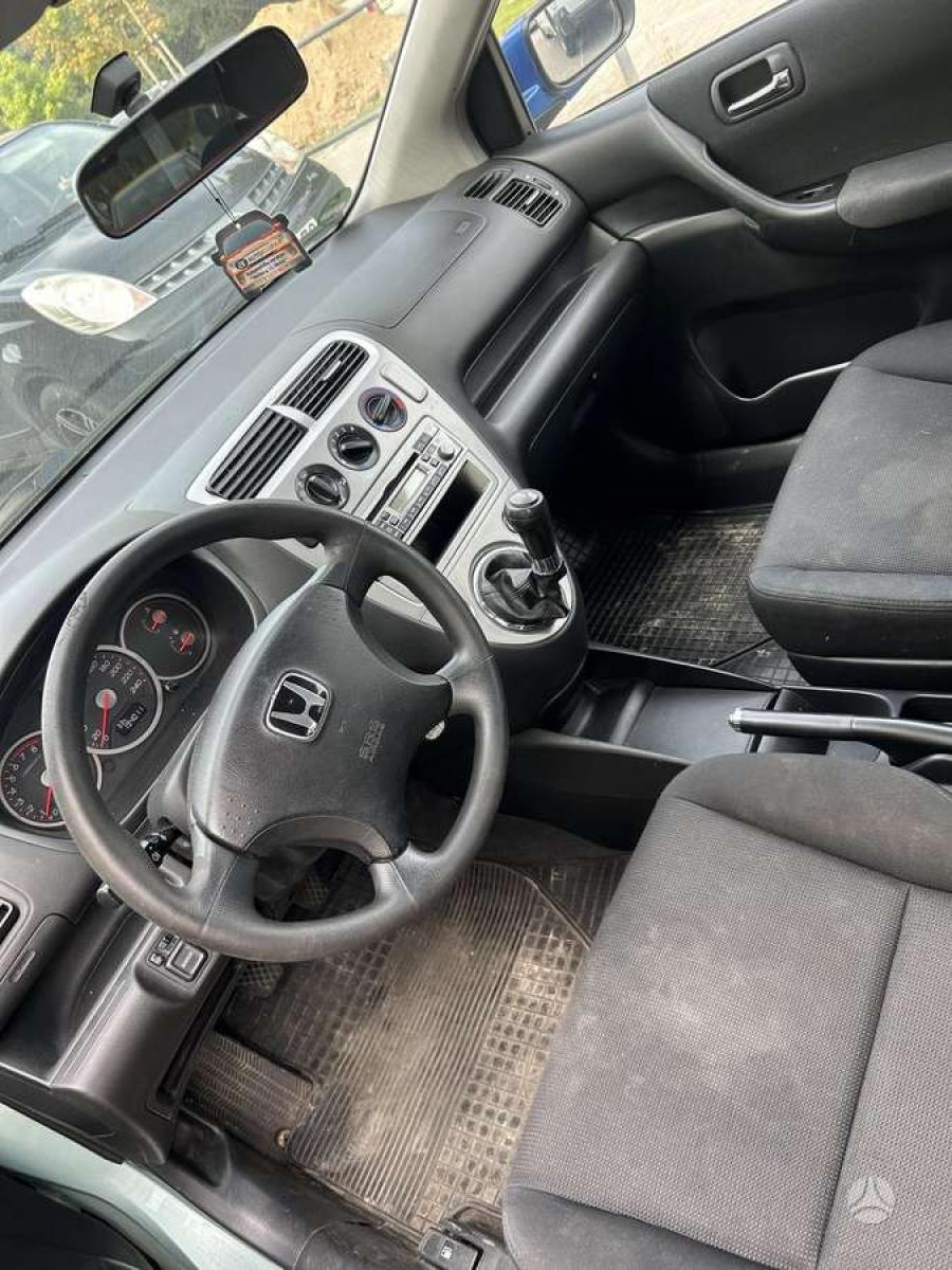 Green Honda Civic 2004 in Vilnius, with an engine capacity of 1.40 L and mileage of 194 thousand km for 1300 €, photo 9 on AUTOMOTO.COM.LV