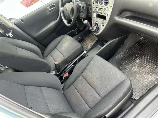 Green Honda Civic 2004 in Vilnius, with an engine capacity of 1.40 L and mileage of 194 thousand km for 1300 €, photo 10 on AUTOMOTO.COM.LV