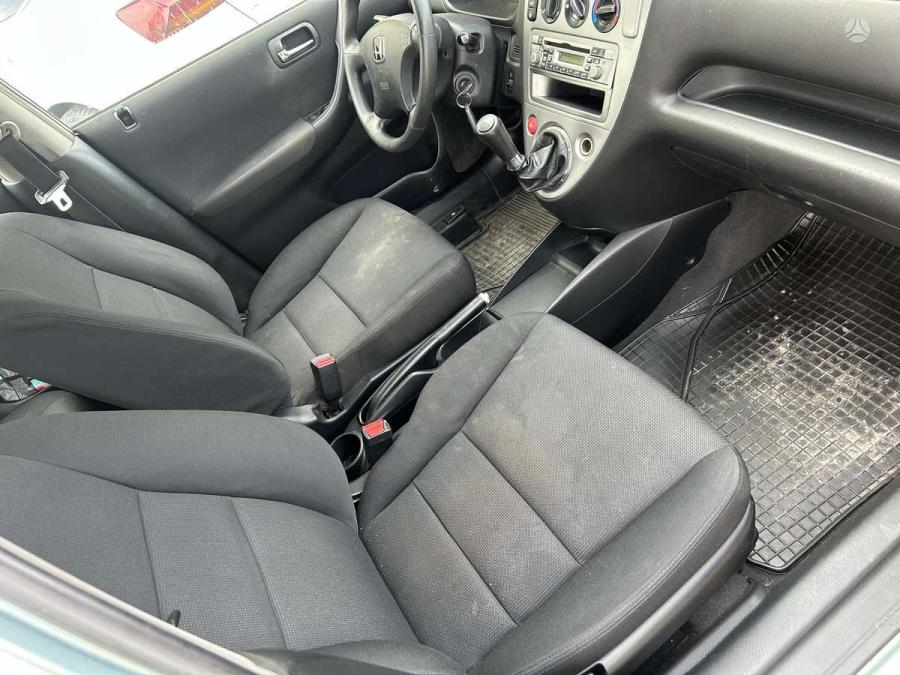 Green Honda Civic 2004 in Vilnius, with an engine capacity of 1.40 L and mileage of 194 thousand km for 1300 €, photo 11 on AUTOMOTO.COM.LV
