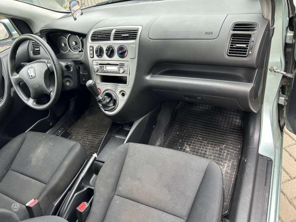 Green Honda Civic 2004 in Vilnius, with an engine capacity of 1.40 L and mileage of 194 thousand km for 1300 €, photo 9 on AUTOMOTO.COM.LV