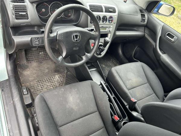 Green Honda Civic 2004 in Vilnius, with an engine capacity of 1.40 L and mileage of 194 thousand km for 1300 €, photo 10 on AUTOMOTO.COM.LV