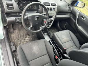 Green Honda Civic 2004 in Vilnius, with an engine capacity of 1.40 L and mileage of 196 thousand km for 1250 €, photo 10 on AUTOMOTO.COM.LV
