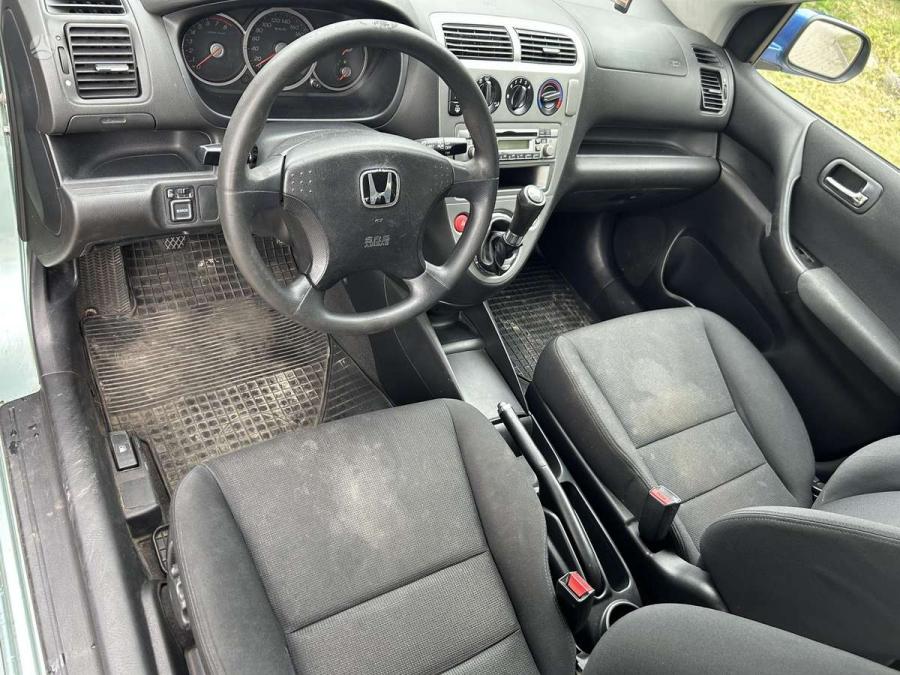 Green Honda Civic 2004 in Vilnius, with an engine capacity of 1.40 L and mileage of 196 thousand km for 1250 €, photo 10 on AUTOMOTO.COM.LV