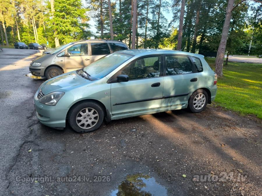 Green Honda Civic 2005 in Tallinn, with an engine capacity of 1.40 L and mileage of 151 thousand km for 1199 €, photo 5 on AUTOMOTO.COM.LV