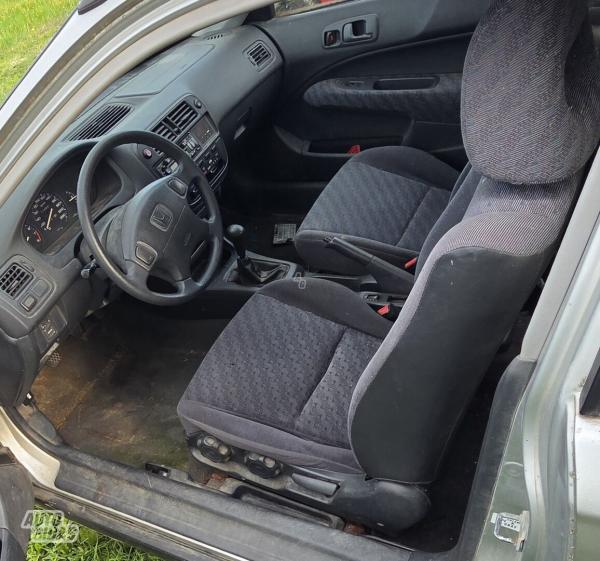 Grey Honda Civic 1999 in Vievis, with an engine capacity of 1.40 L and mileage of 252 thousand km for 650 €, photo 4 on AUTOMOTO.COM.LV