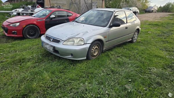 Grey Honda Civic 1999 in Vievis, with an engine capacity of 1.40 L and mileage of 252 thousand km for 650 €, photo 6 on AUTOMOTO.COM.LV