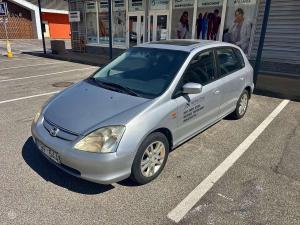 Grey Honda Civic 2001 in Vilnius, with an engine capacity of 1.59 L and mileage of 223 thousand km for 1500 €, photo  on AUTOMOTO.COM.LV
