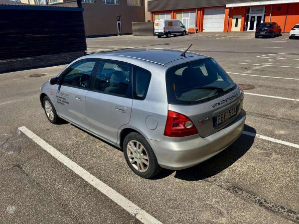 Grey Honda Civic 2001 in Vilnius, with an engine capacity of 1.59 L and mileage of 223 thousand km for 1500 €, photo 4 on AUTOMOTO.COM.LV
