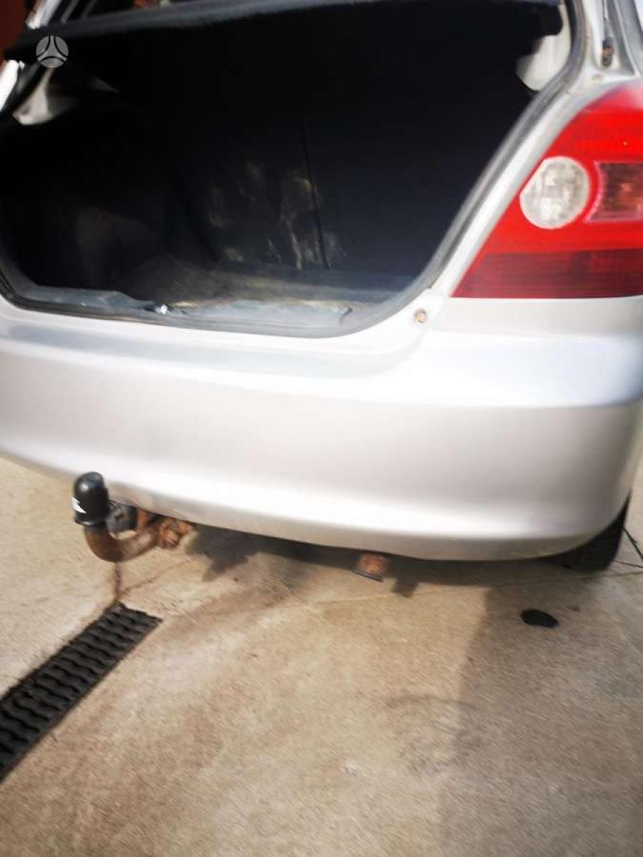 Grey Honda Civic 2001 in Kaunas, with an engine capacity of 1.40 L and mileage of 282 thousand km for 690 €, photo 13 on AUTOMOTO.COM.LV