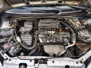 Grey Honda Civic 2001 in Kaunas, with an engine capacity of 1.40 L and mileage of 282 thousand km for 690 €, photo 14 on AUTOMOTO.COM.LV