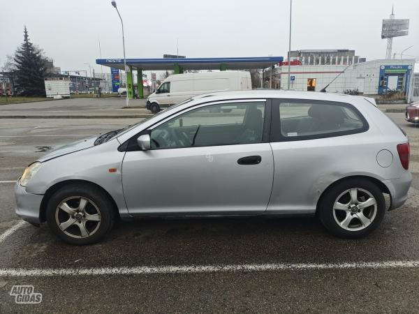 Grey Honda Civic 2002 in Kaunas, with an engine capacity of 1.40 L and mileage of 272 thousand km for 550 €, photo 2 on AUTOMOTO.COM.LV