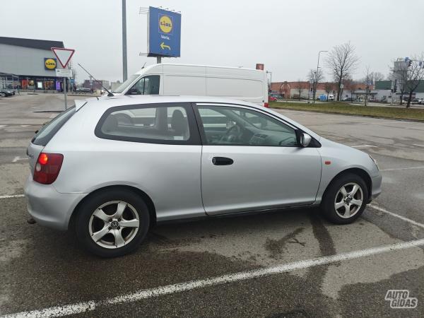 Grey Honda Civic 2002 in Kaunas, with an engine capacity of 1.40 L and mileage of 272 thousand km for 550 €, photo 6 on AUTOMOTO.COM.LV