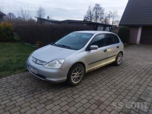 Grey Honda Civic 2003 in Riga, with an engine capacity of 1.40 L and mileage of 266 thousand km for 1450 €, photo  on AUTOMOTO.COM.LV