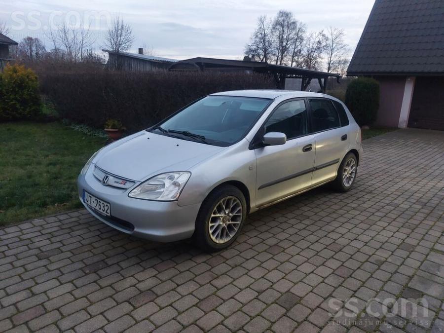 Grey Honda Civic 2003 in Riga, with an engine capacity of 1.40 L and mileage of 266 thousand km for 1450 €, photo 1 on AUTOMOTO.COM.LV