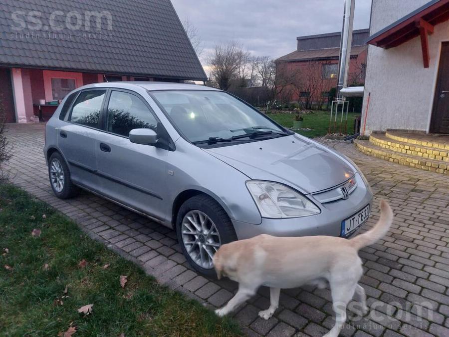 Grey Honda Civic 2003 in Riga, with an engine capacity of 1.40 L and mileage of 266 thousand km for 1450 €, photo 3 on AUTOMOTO.COM.LV