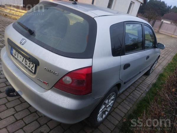 Grey Honda Civic 2003 in Riga, with an engine capacity of 1.40 L and mileage of 266 thousand km for 1450 €, photo 5 on AUTOMOTO.COM.LV