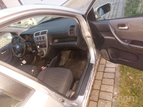 Grey Honda Civic 2003 in Riga, with an engine capacity of 1.40 L and mileage of 266 thousand km for 1450 €, photo 8 on AUTOMOTO.COM.LV