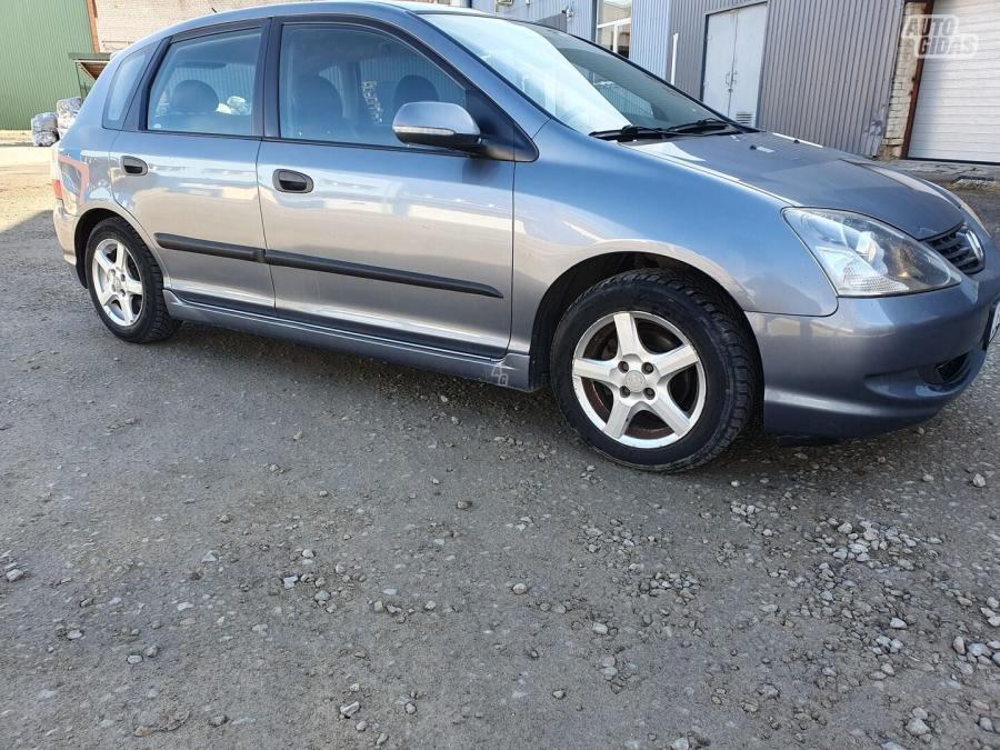 Grey Honda Civic 2004 in Siauliai, with an engine capacity of 1.70 L and mileage of 252 thousand km for 1250 €, photo 5 on AUTOMOTO.COM.LV