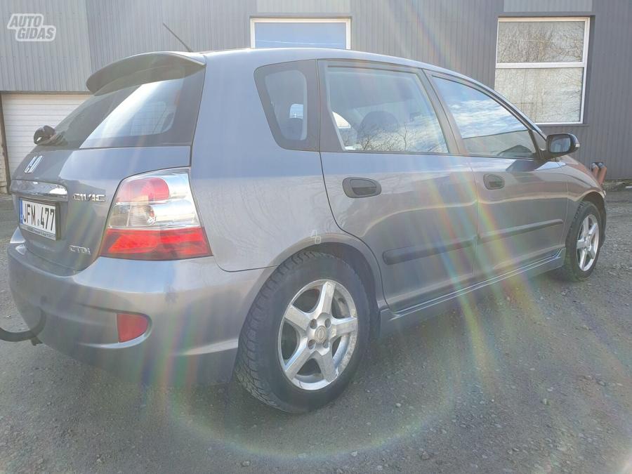 Grey Honda Civic 2004 in Siauliai, with an engine capacity of 1.70 L and mileage of 252 thousand km for 1250 €, photo 11 on AUTOMOTO.COM.LV