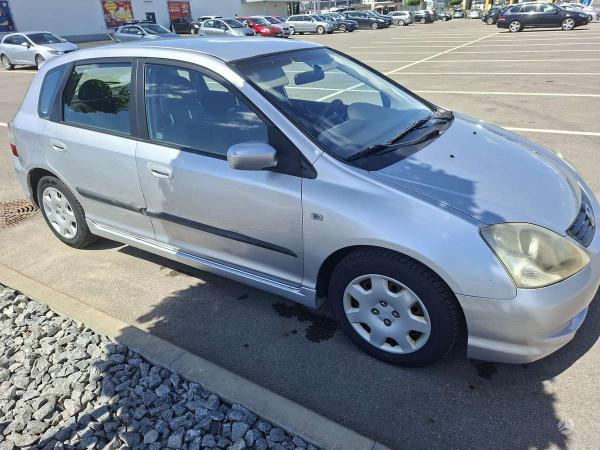 Pelēks Honda Civic 2004 Kauņa, ar dzinēja tilpumu 1.59 L un nobraukumu 264 tūkst. km par 1300 €, foto 1 vietnē AUTOMOTO.COM.LV