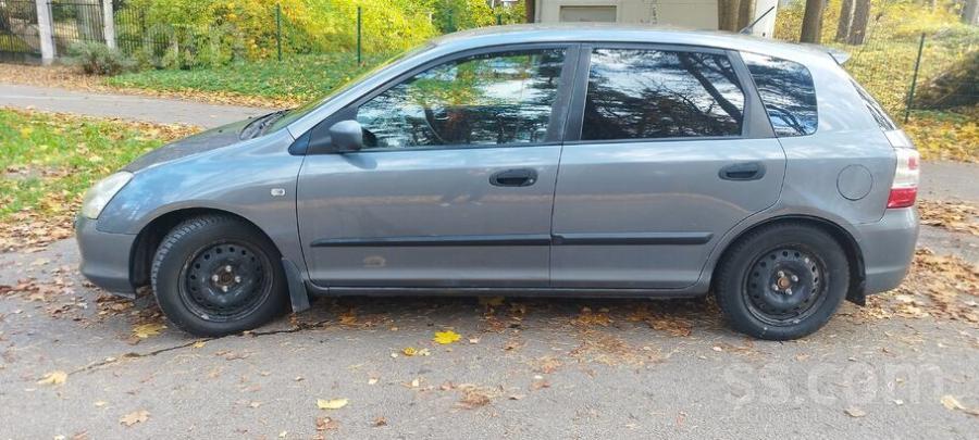 Grey Honda Civic 2004 in Riga, with an engine capacity of 1.40 L and mileage of 269 thousand km for 1000 €, photo 3 on AUTOMOTO.COM.LV