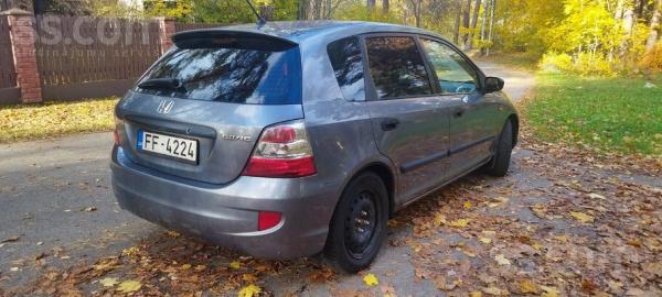 Pelēks Honda Civic 2004 Rīga, ar dzinēja tilpumu 1.40 L un nobraukumu 269 tūkst. km par 1000 €, foto 4 vietnē AUTOMOTO.COM.LV