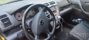 Grey Honda Civic 2004 in Riga, with an engine capacity of 1.40 L and mileage of 269 thousand km for 1000 €, photo 7 on AUTOMOTO.COM.LV