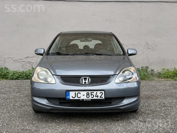 Grey Honda Civic 2004 in Riga, with an engine capacity of 1.70 L and mileage of 346 thousand km for 550 €, photo 4 on AUTOMOTO.COM.LV