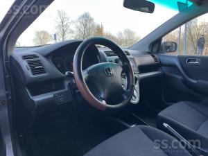 Pelēks Honda Civic 2005 Rīga, ar dzinēja tilpumu 1.60 L un nobraukumu 243 tūkst. km par 2000 €, foto 11 vietnē AUTOMOTO.COM.LV