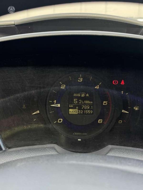 Grey Honda Civic 2006 in Kaunas, with an engine capacity of 2.20 L and mileage of 322 thousand km for 1350 €, photo 4 on AUTOMOTO.COM.LV