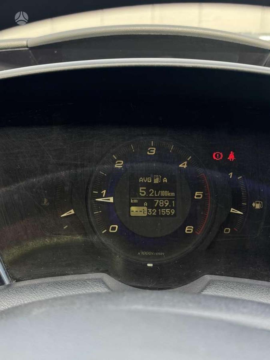 Grey Honda Civic 2006 in Kaunas, with an engine capacity of 2.20 L and mileage of 322 thousand km for 1350 €, photo 5 on AUTOMOTO.COM.LV