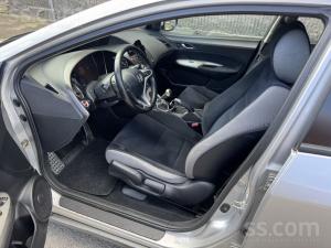 Pelēks Honda Civic 2007 Rīga, ar dzinēja tilpumu 2.20 L un nobraukumu 287 tūkst. km par 1600 €, foto 9 vietnē AUTOMOTO.COM.LV