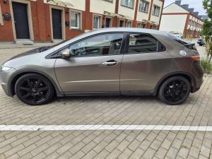 Grey Honda Civic 2008 in Vilnius, with an engine capacity of 2.20 L and mileage of 304 thousand km for 1850 €, photo 8 on AUTOMOTO.COM.LV