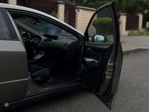 Grey Honda Civic 2010 in Vilnius, with an engine capacity of 1.80 L and mileage of 225 thousand km for 3450 €, photo 31 on AUTOMOTO.COM.LV