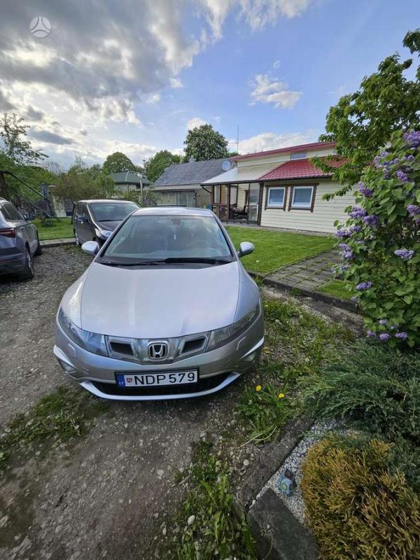 Grey Honda Civic 2011 in Kaunas, with an engine capacity of 1.33 L and mileage of 234 thousand km for 3450 €, photo 1 on AUTOMOTO.COM.LV