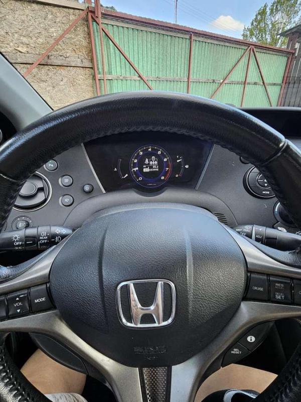 Grey Honda Civic 2011 in Kaunas, with an engine capacity of 1.33 L and mileage of 234 thousand km for 3450 €, photo 5 on AUTOMOTO.COM.LV