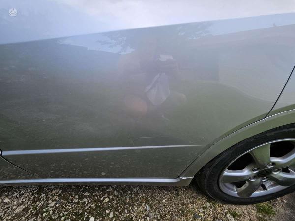 Grey Honda Civic 2011 in Kaunas, with an engine capacity of 1.33 L and mileage of 234 thousand km for 3450 €, photo 10 on AUTOMOTO.COM.LV