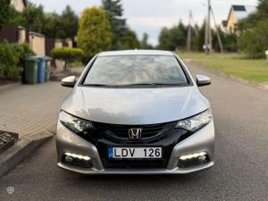 Grey Honda Civic 2016 in Vilnius, with an engine capacity of 1.80 L and mileage of 180 thousand km for 8450 €, photo 27 on AUTOMOTO.COM.LV