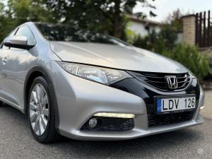 Grey Honda Civic 2016 in Vilnius, with an engine capacity of 1.80 L and mileage of 180 thousand km for 8450 €, photo 28 on AUTOMOTO.COM.LV